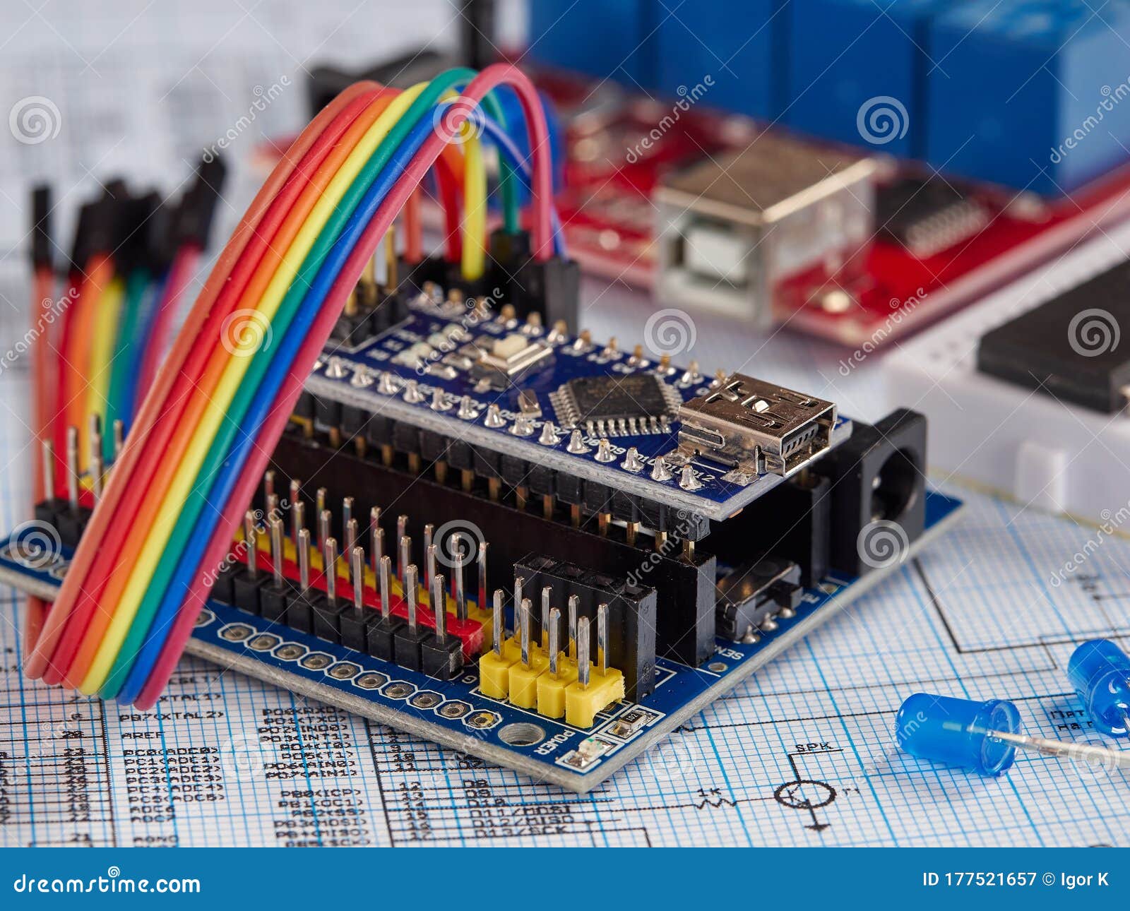 Arduino And Programmers With Peripherals And Expansion Boards Lie On A ...