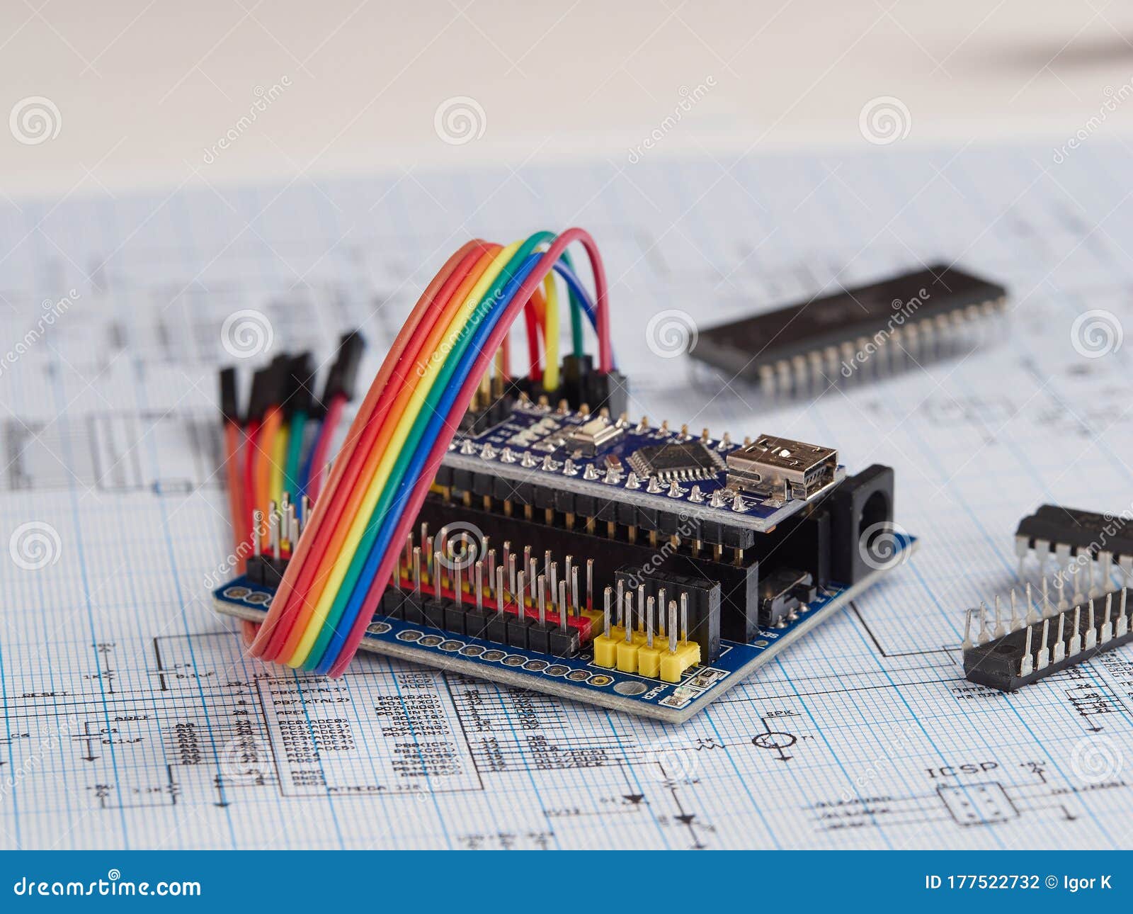 Arduino And Programmers With Peripherals And Expansion Boards Lie On A ...