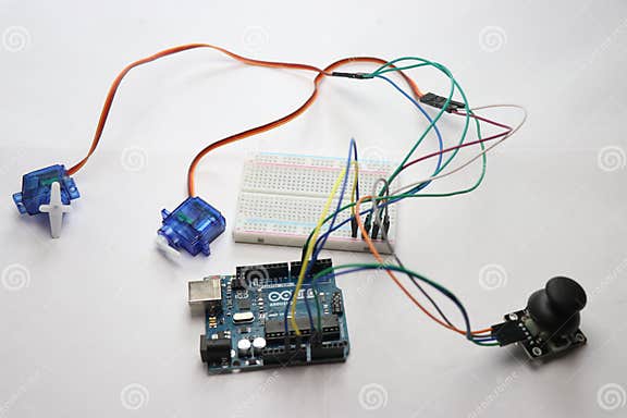 Arduino Uno Board Connected To Micro Servo And Joystick Using Jumper Wires And Breadboard 