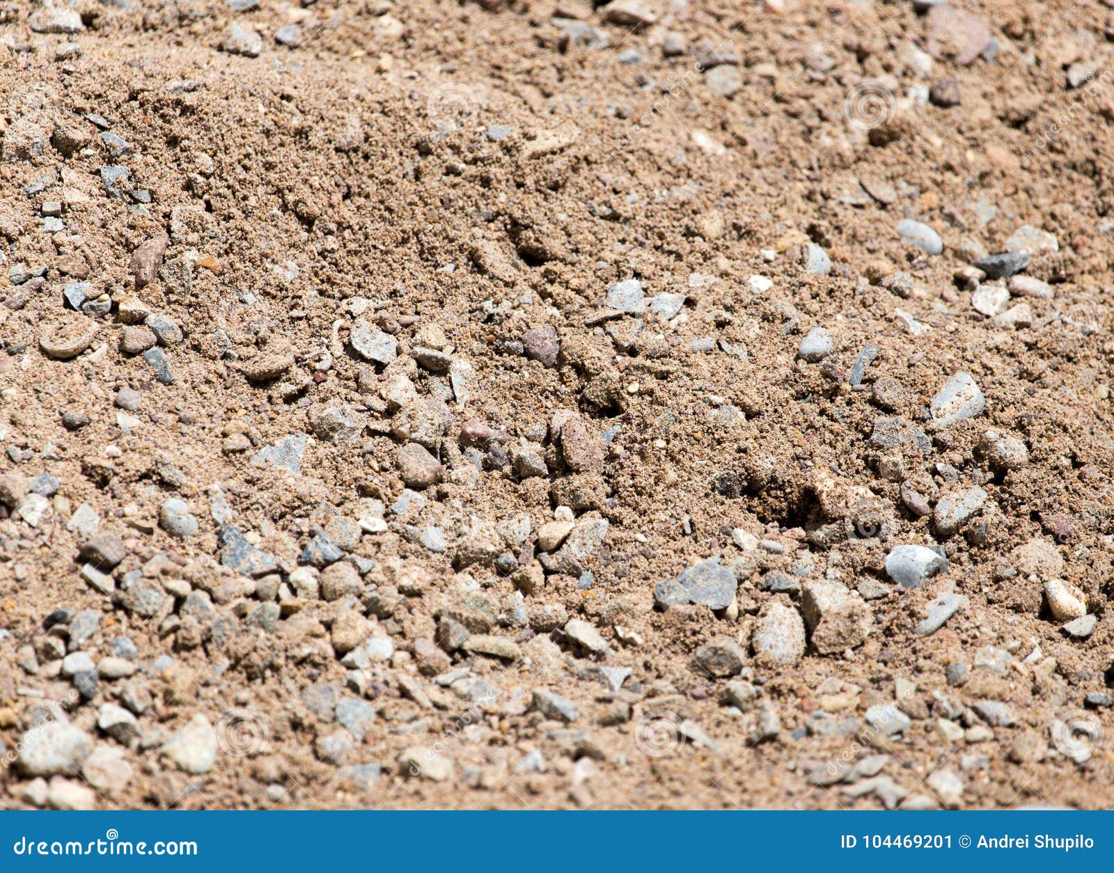 Arena con grava como fondo imagen de archivo. Imagen de color - 104469201