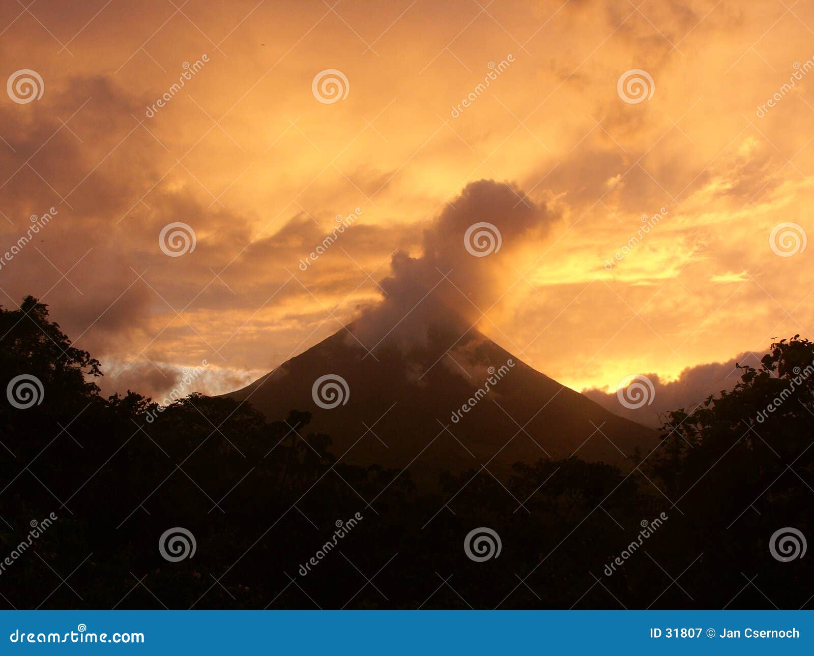 Arenal Volcano at dawn stock image. Image of trees, dawn - 31807