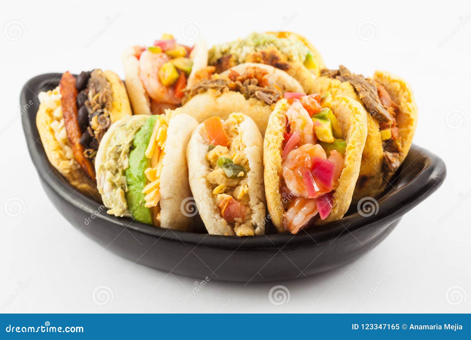 Arepas with Assorted Fillings Served in a Black Ceramic Dish Stock ...