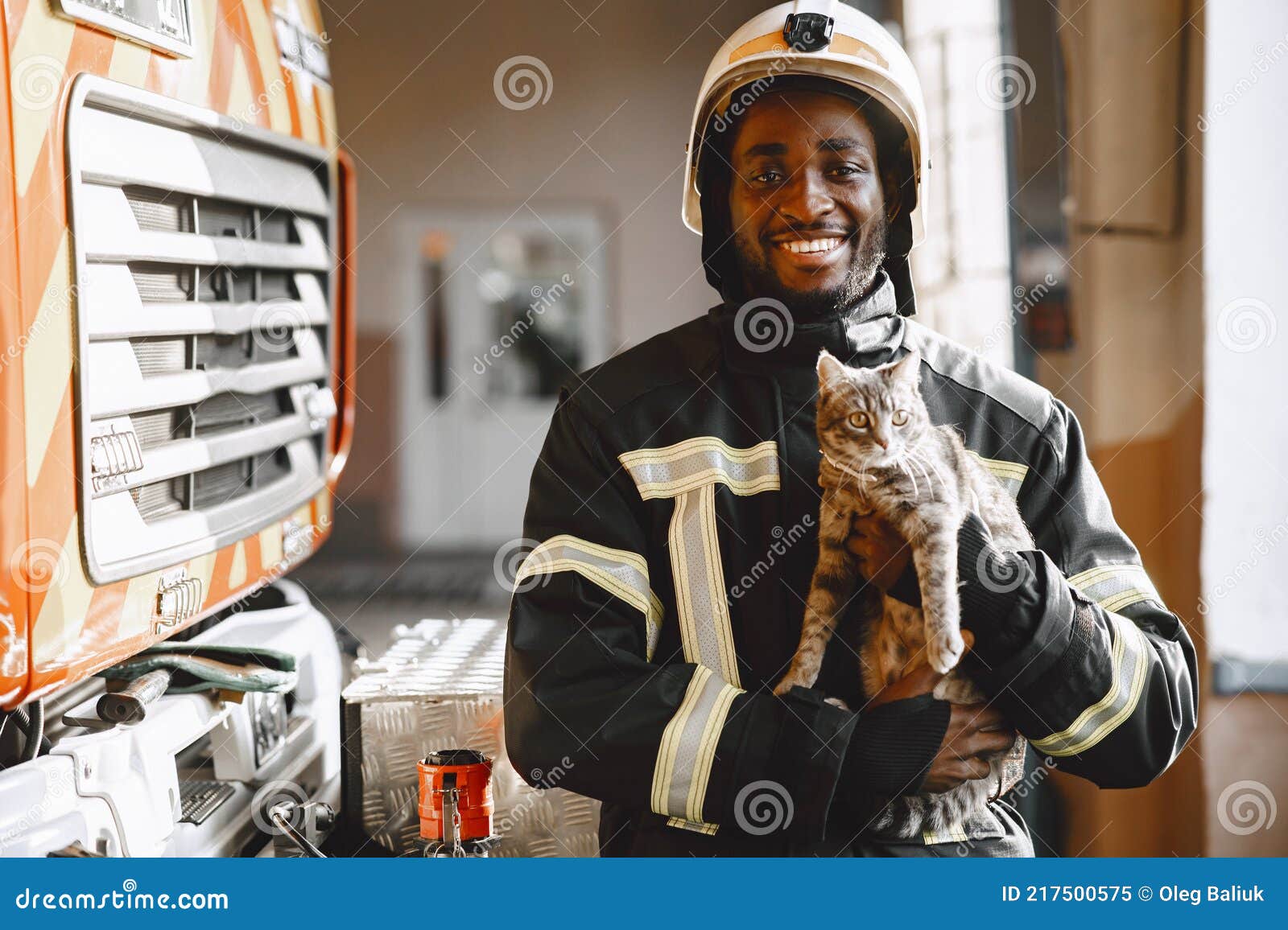 Portrait of a Firefighter Standing in Front of a Fire Engine Stock ...
