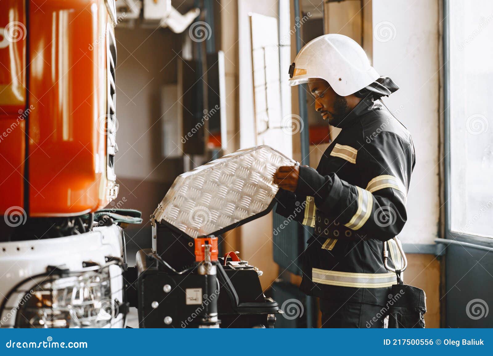 Portrait of a Firefighter Standing in Front of a Fire Engine Stock ...