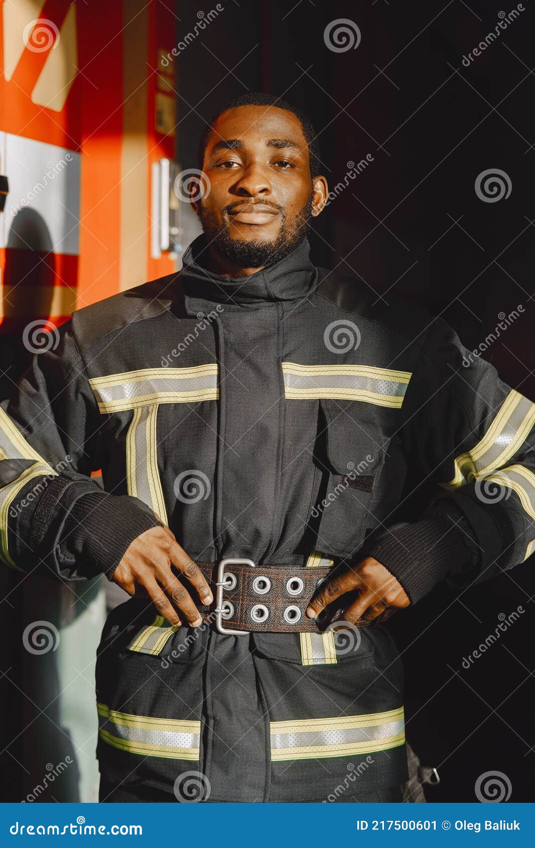 Portrait of a Firefighter Standing in Front of a Fire Engine Stock ...