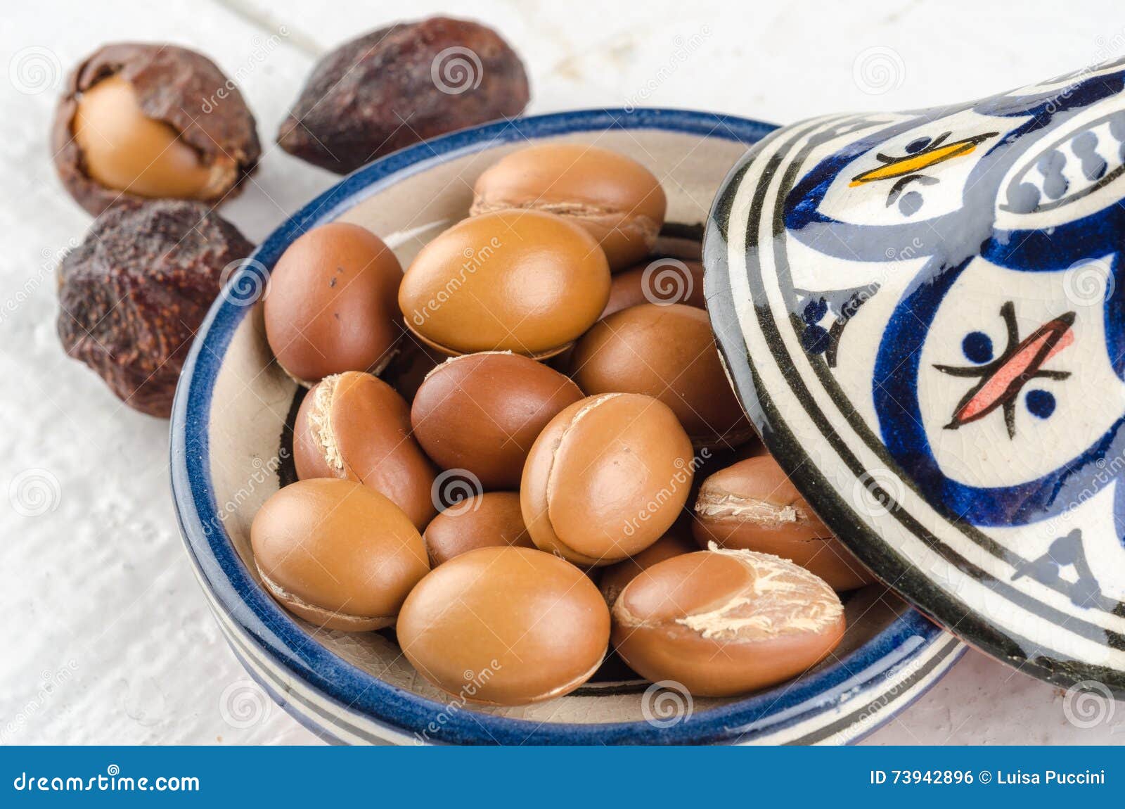 Argan Fruit in a Moroccan Tajine Stock Photo - Image of seed, wooden ...