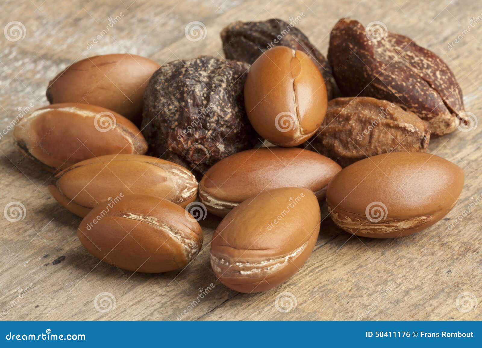 Argan Nuts Isolated. Three Argan Nuts With Green Leaves On An Isolated ...