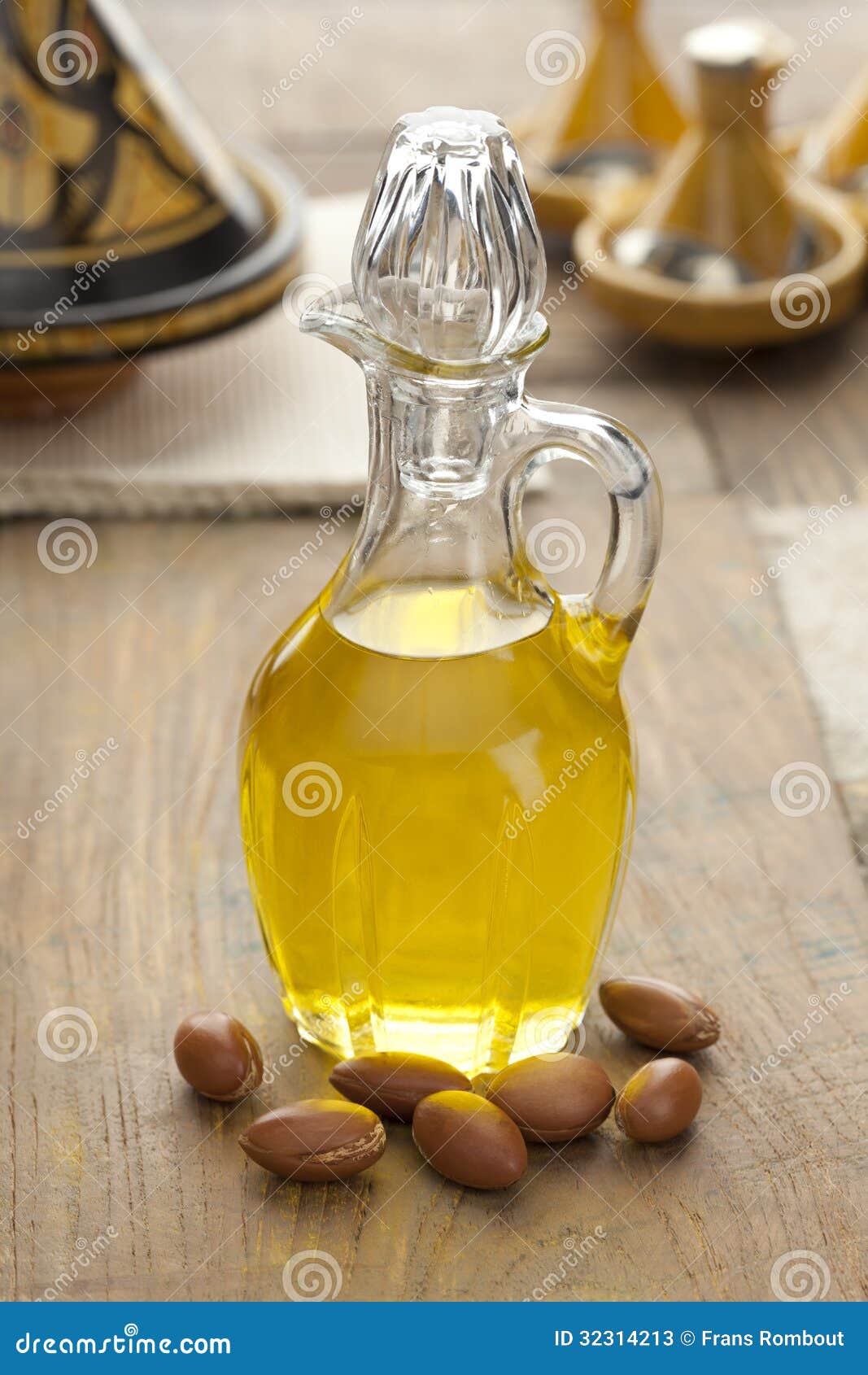 Argan oil and nuts stock image. Image of spinosa, gourmet - 32314213