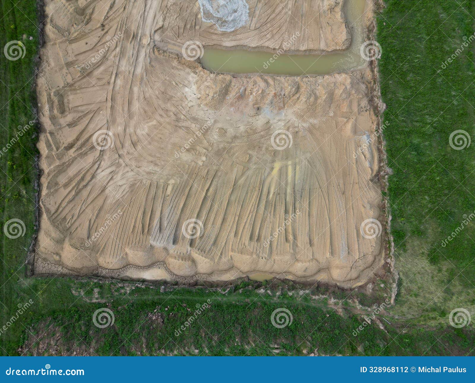 Arial View of Open Pit Sand Mine. a Front Loader Loads Sand from Piles ...