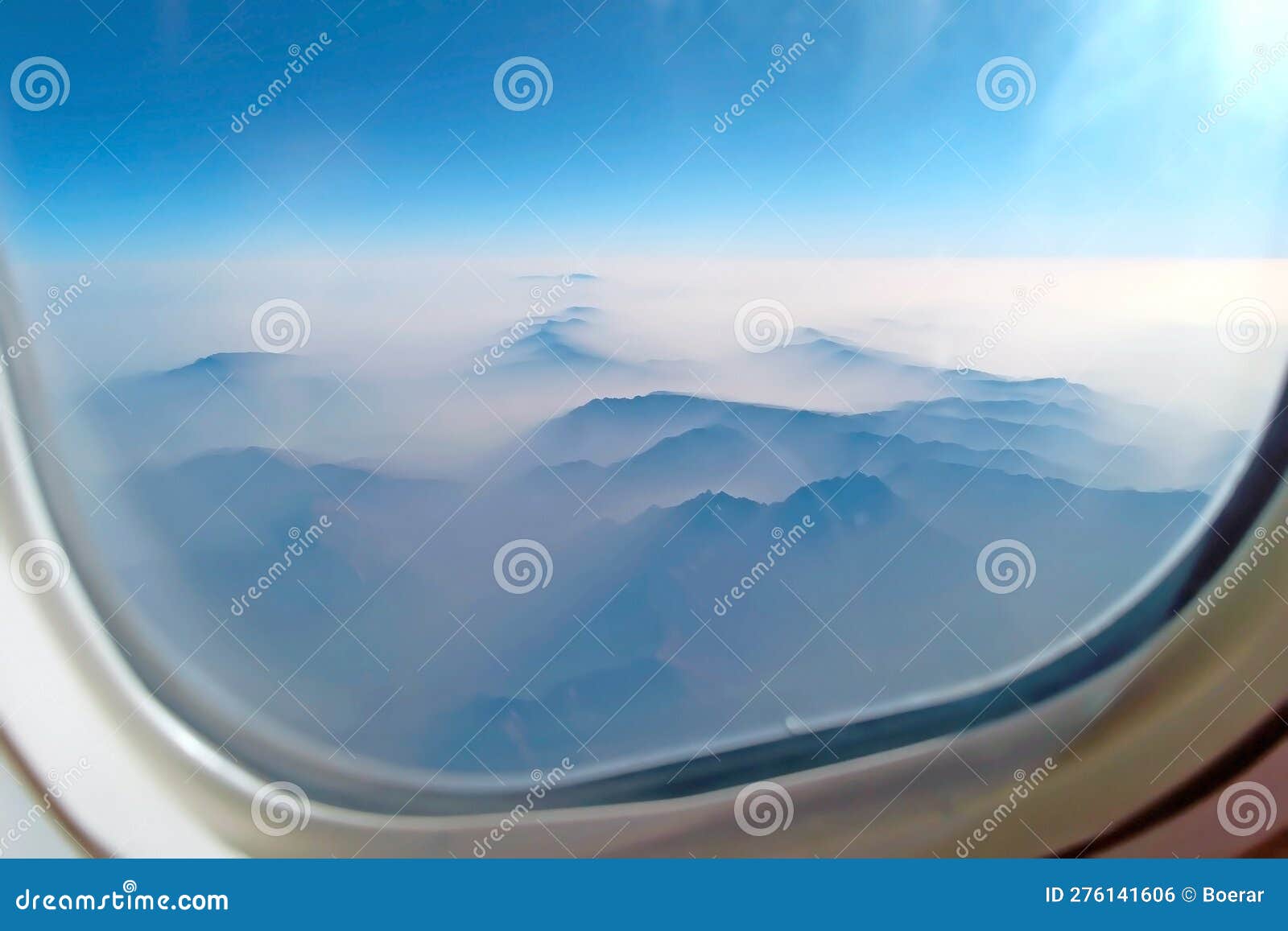 The Arial View from the Plane Window on the Mountain Ridge, Clouds and ...