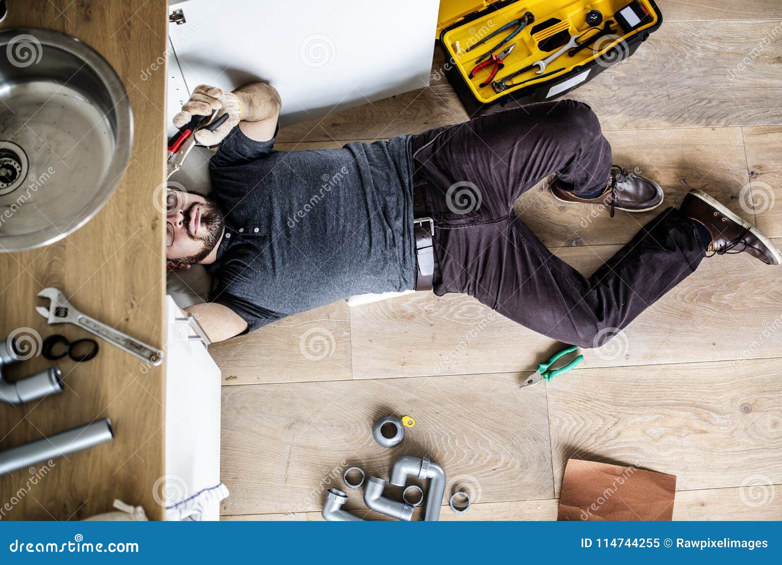Ariel View Man Fixing Kitchen Sink Stock Image - Image of handyman ...