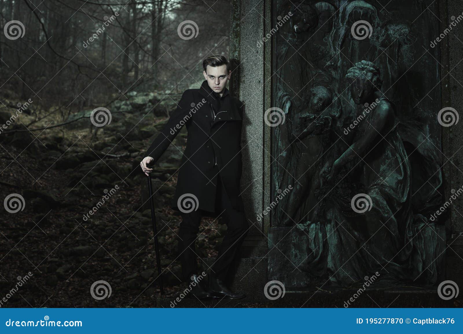 Aristocratic Vampire Leaning To Graveyard Statue Stock Photo - Image of ...