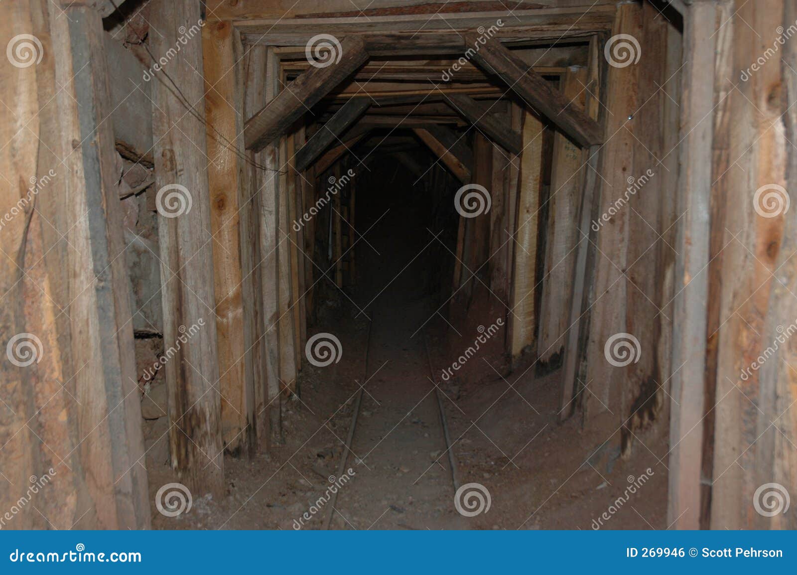 Mine Entrance Barred By Warnbing Sign On A Barbed Wire Fence And A ...