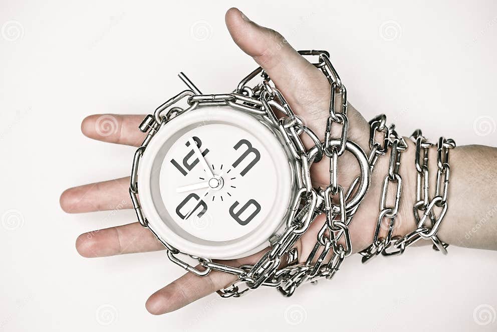 Arm chained with a clock stock photo. Image of stuck - 35260868
