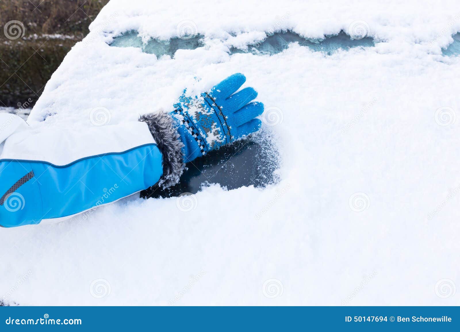 Arm with Glove Removing Snow from Car Window Stock Photo - Image of ...