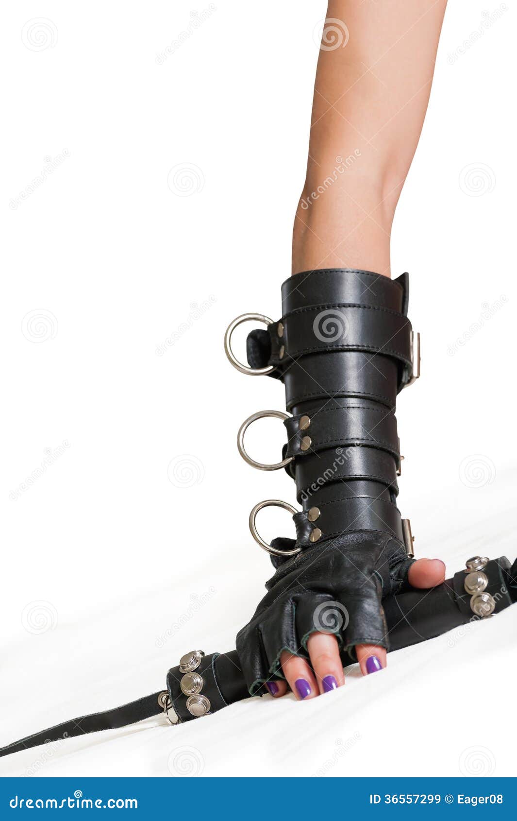 Arm with lash in bed sheet stock image. Image of domination - 36557299