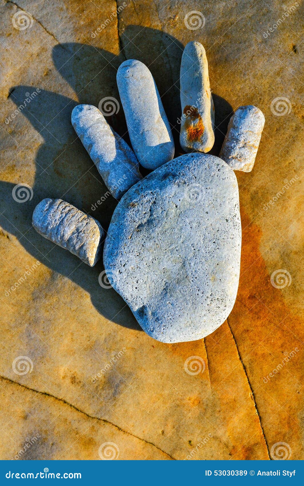 Arm trace of pebbles stock image. Image of idea, five - 53030389