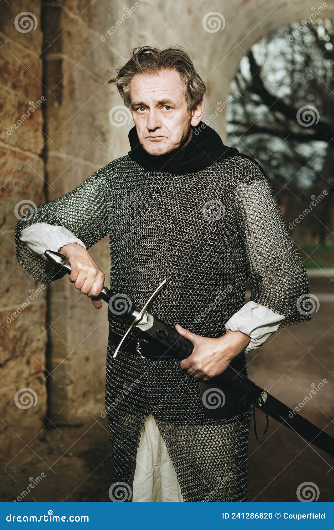Armed Man in Chain Armor with Sword Serving As Guard on Castle Gateway ...