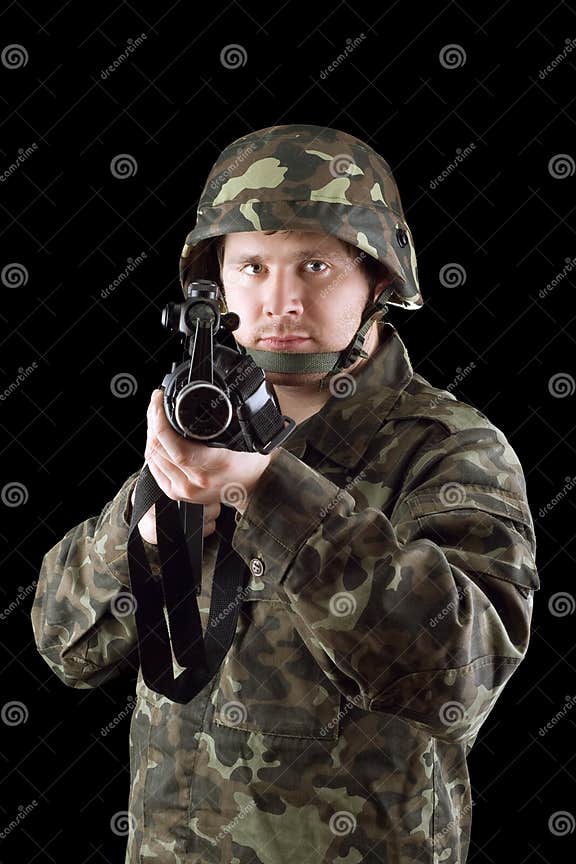 Armed man pointing a rifle stock photo. Image of rifle - 34748188