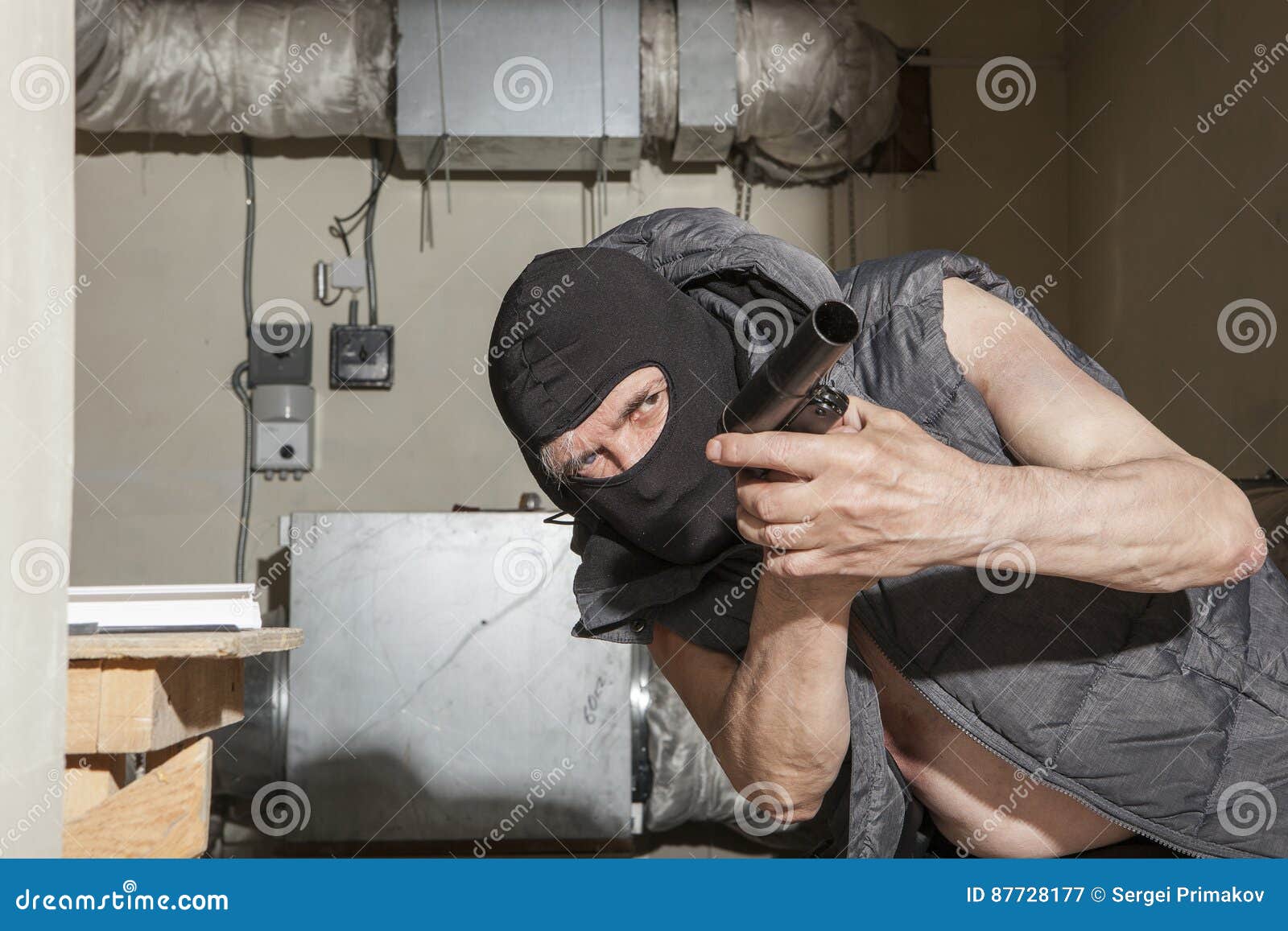Armed Robber with a Gun in the Attic Stock Image - Image of weapon ...