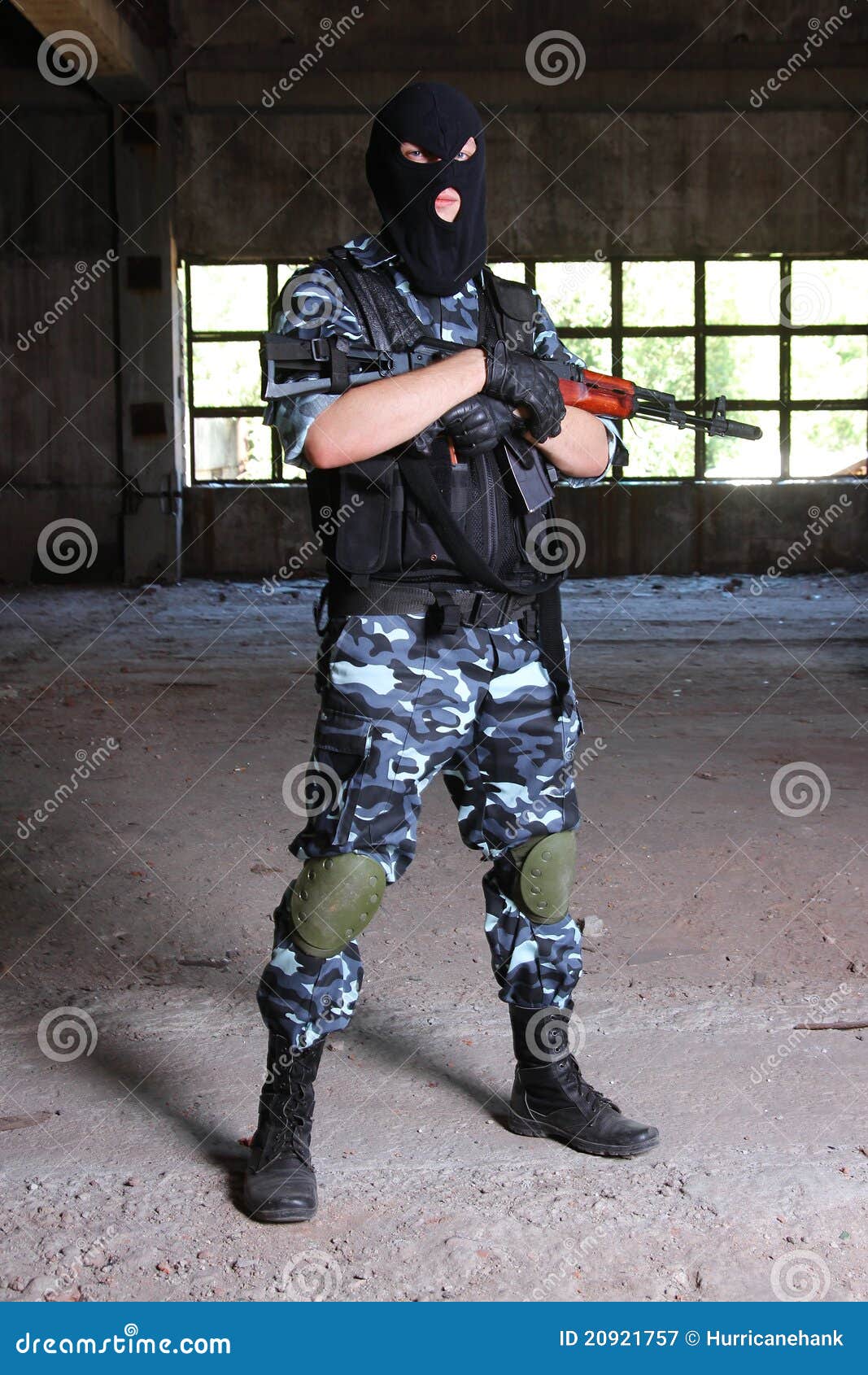 Armed Soldier in Black Mask Hodling a Gun Stock Image - Image of ...