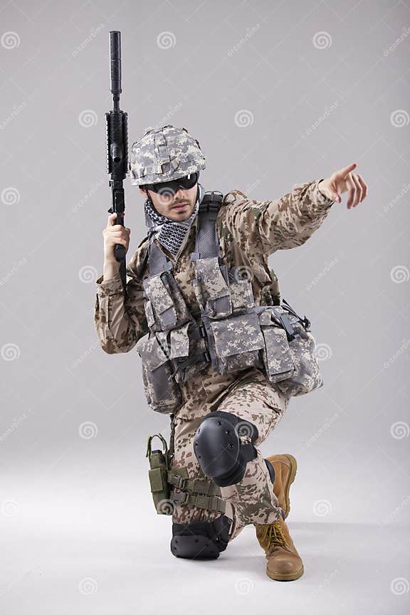 Armed Soldier Pointing with Finger Stock Image - Image of holding ...