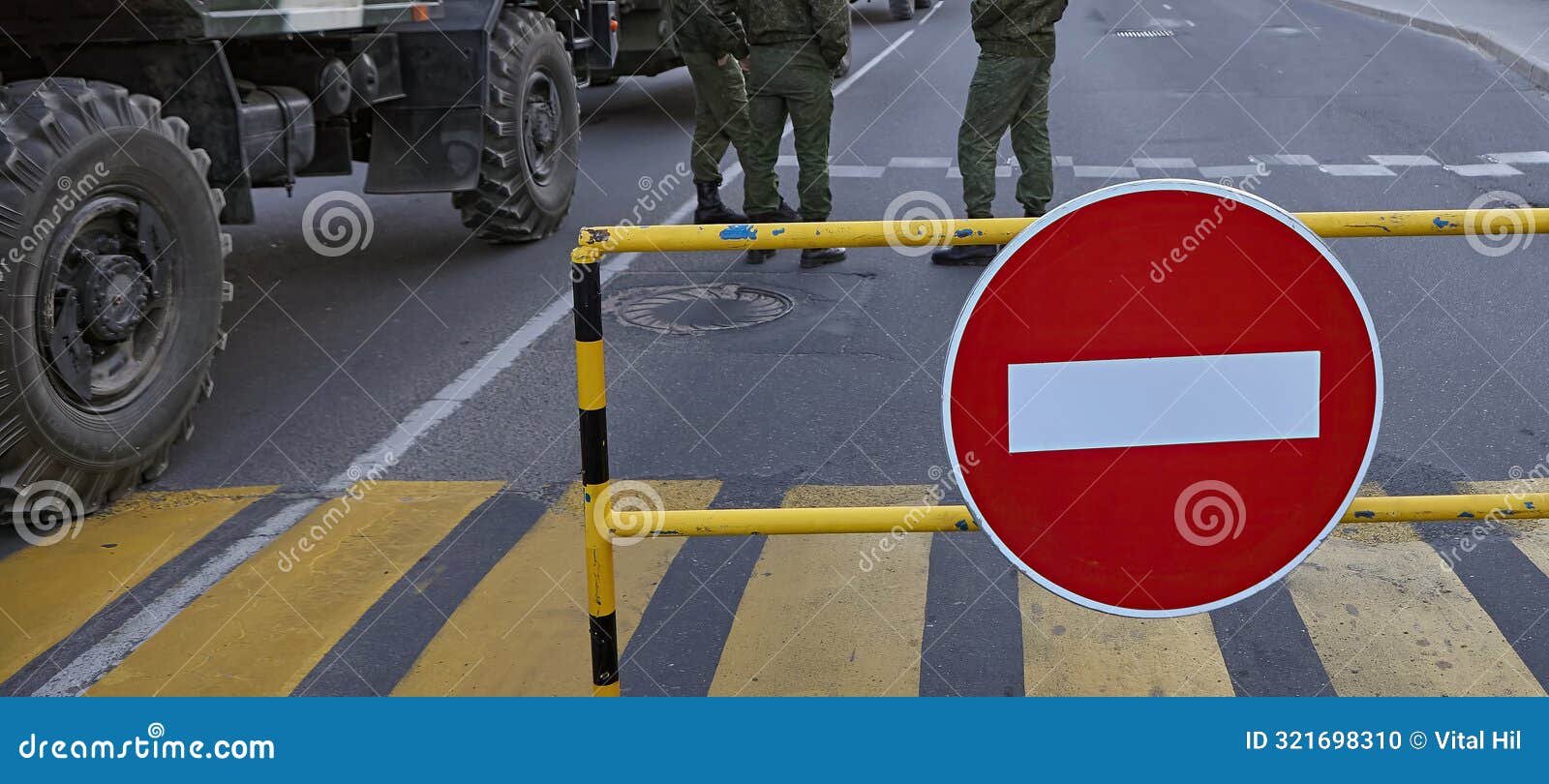 Armed Soldiers Standing Near A Roadblock With A No Entry Sign In The ... Armed Soldiers Standing Near A Roadblock With A No Entry Sign In The ...