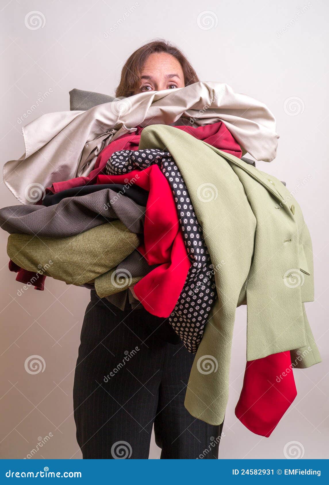 Armload of clothes stock image. Image of cleaners, mother - 24582931