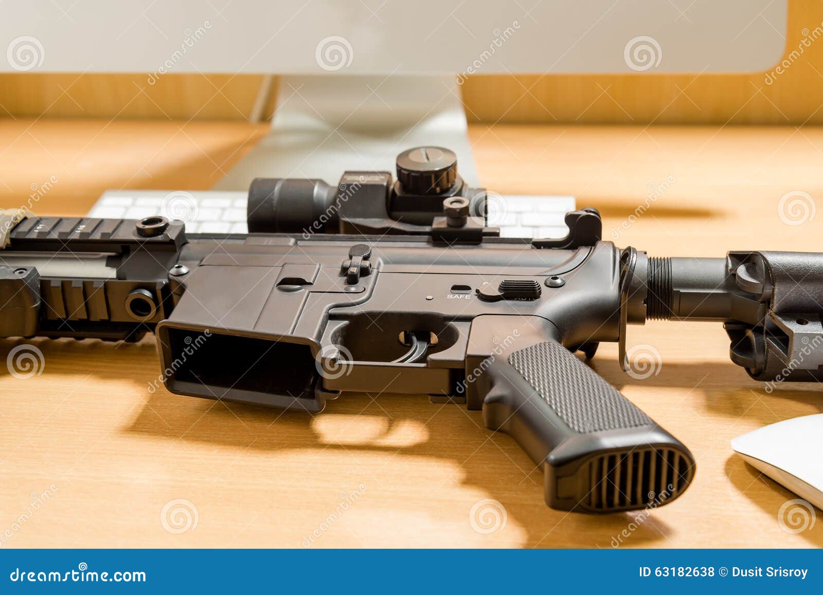Army Carbine on a Wooden Computer Table in Office Room Stock Photo ...