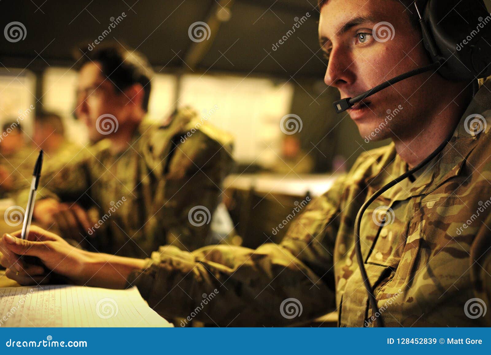 British Army Communications Operator at a Remote Command Centre ...
