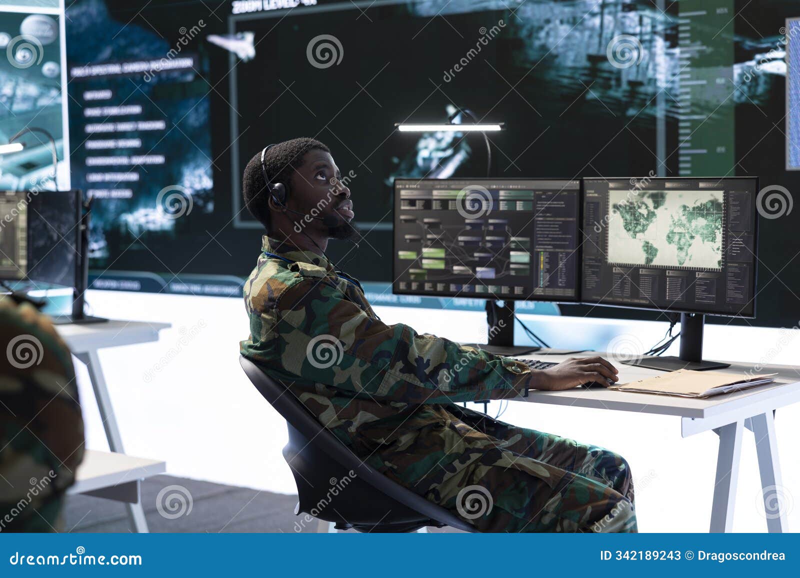 Army Officer Working with Modern Computer Systems and Satellite Data ...