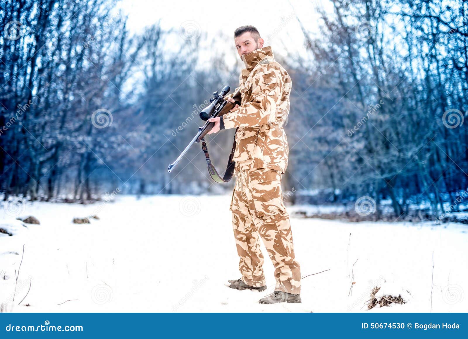 Army Sniper during Military Operation Using a Professional Rifle on a ...