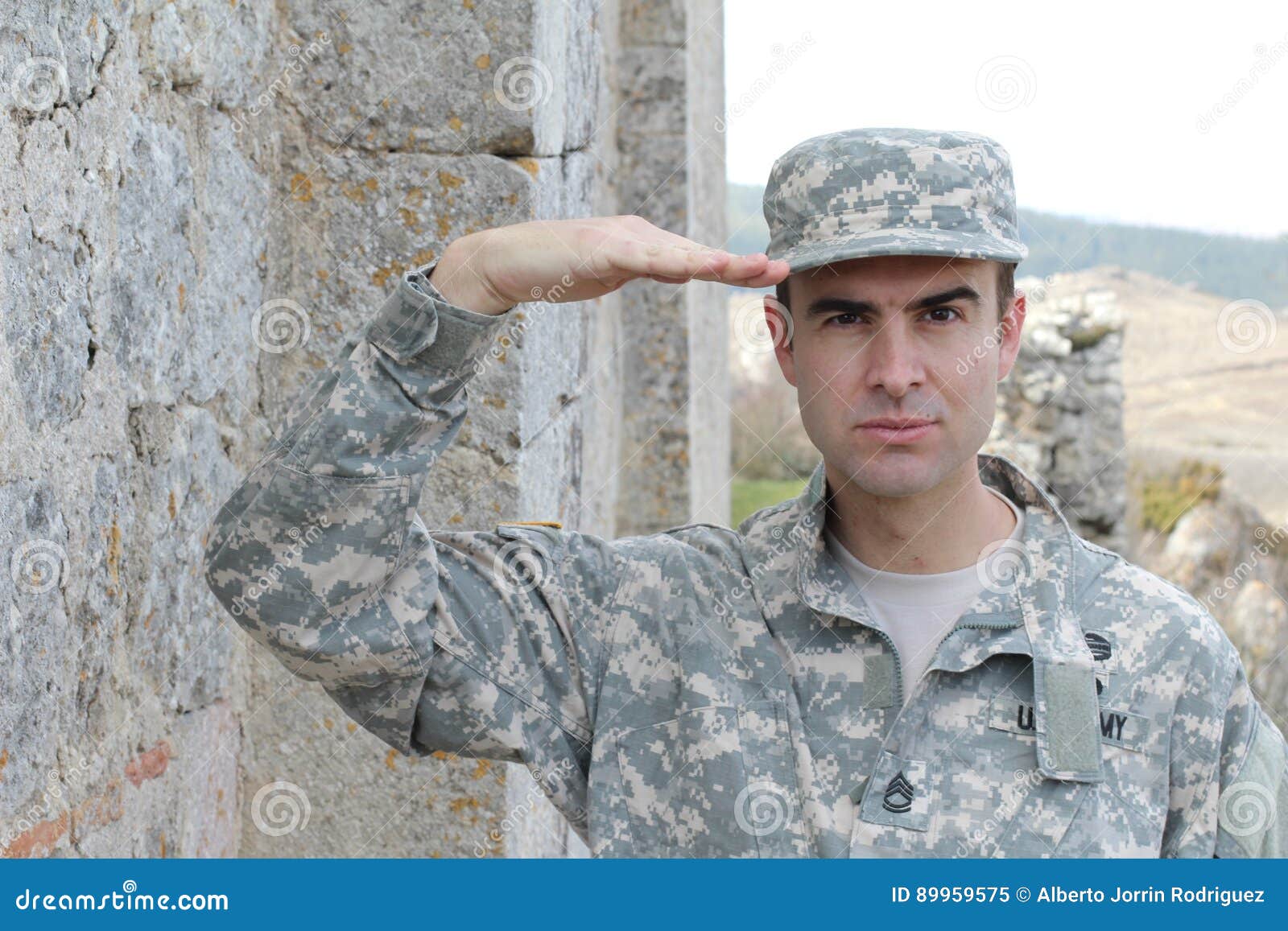 Army Soldier Saluting in Front of a Place in Ruins Stock Image - Image ...