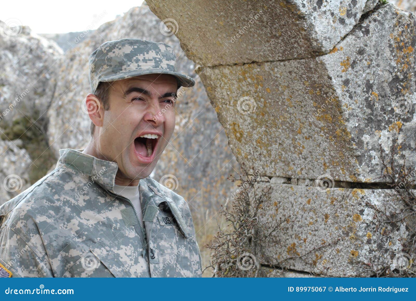 Army Soldier Screaming in Front of Some Ruins with Copy Space Stock ...