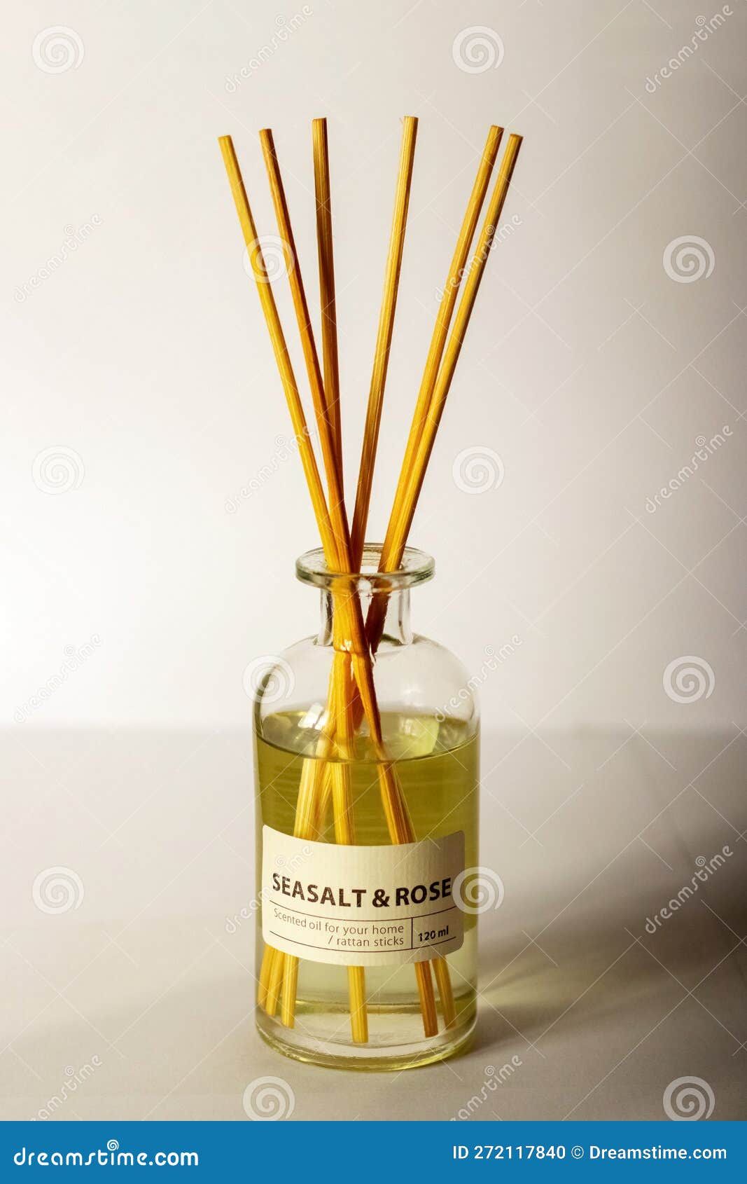 An Aroma Diffuser with Aromatic Oil and Sticks in the Room Creates an ...