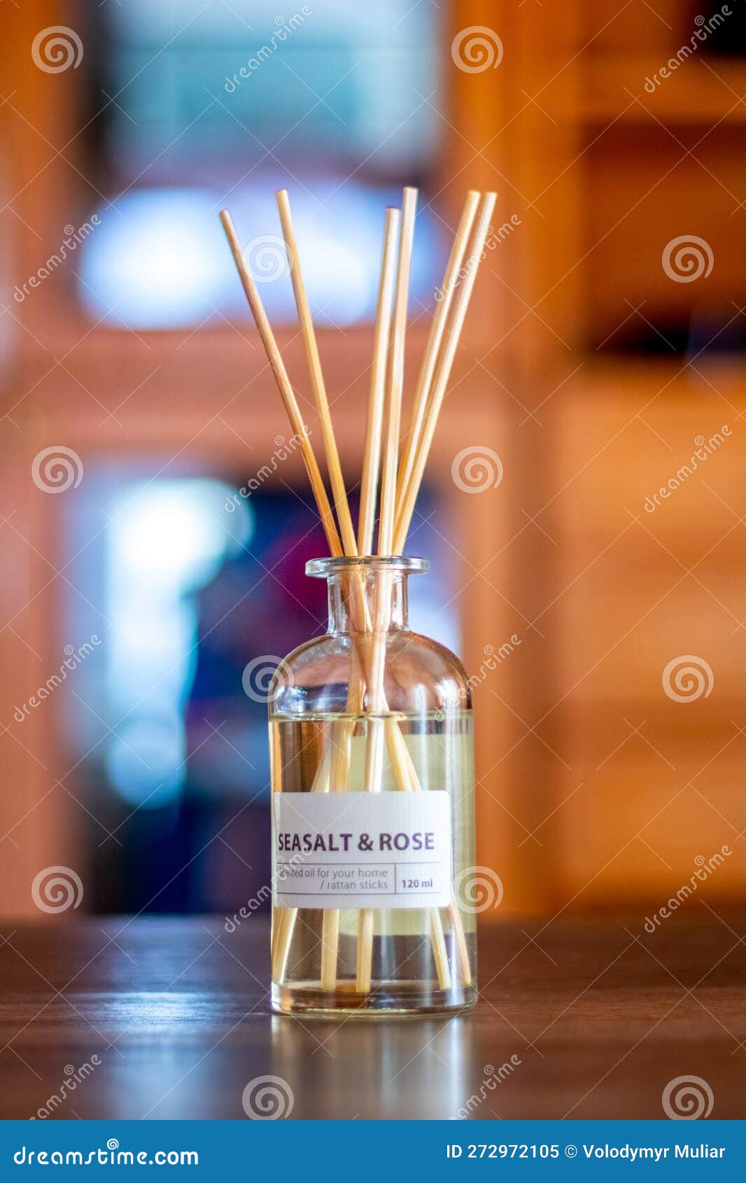 An Aroma Diffuser with Aromatic Oil and Sticks in the Room Creates an ...