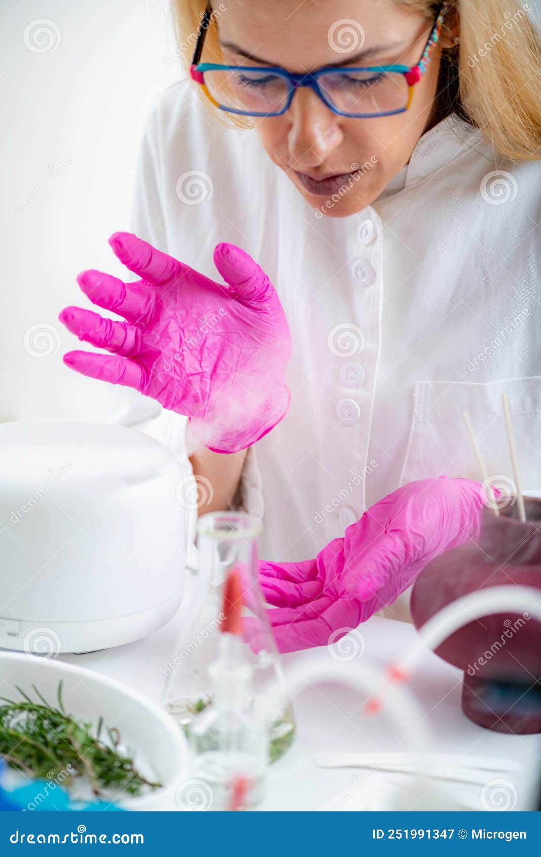 Aroma Diffuser in a Lab, Olfactory Science Technician Smelling the ...