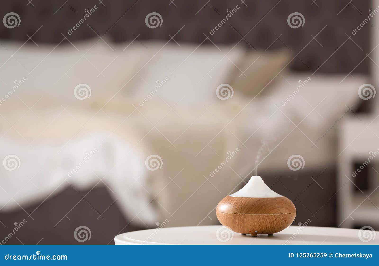 Aroma Oil Diffuser Lamp on Table Stock Image - Image of background ...