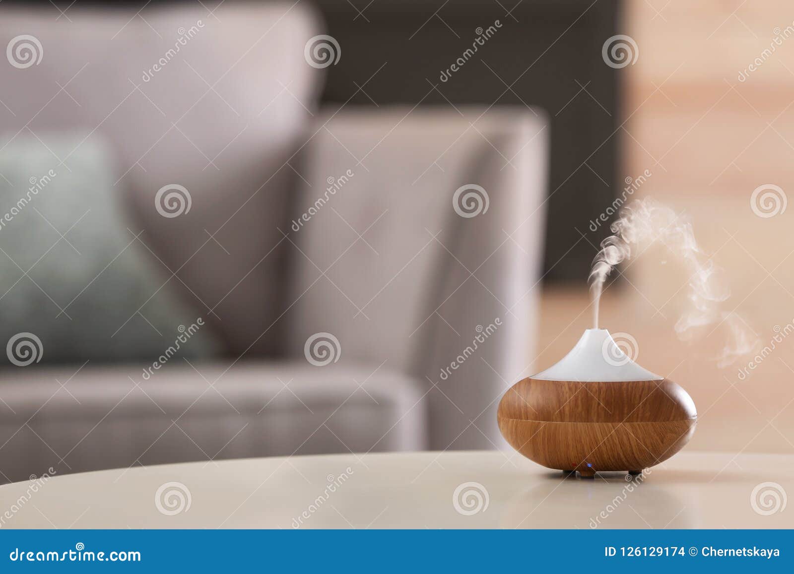 Aroma Oil Diffuser Lamp on Table Stock Photo - Image of electric, copy ...