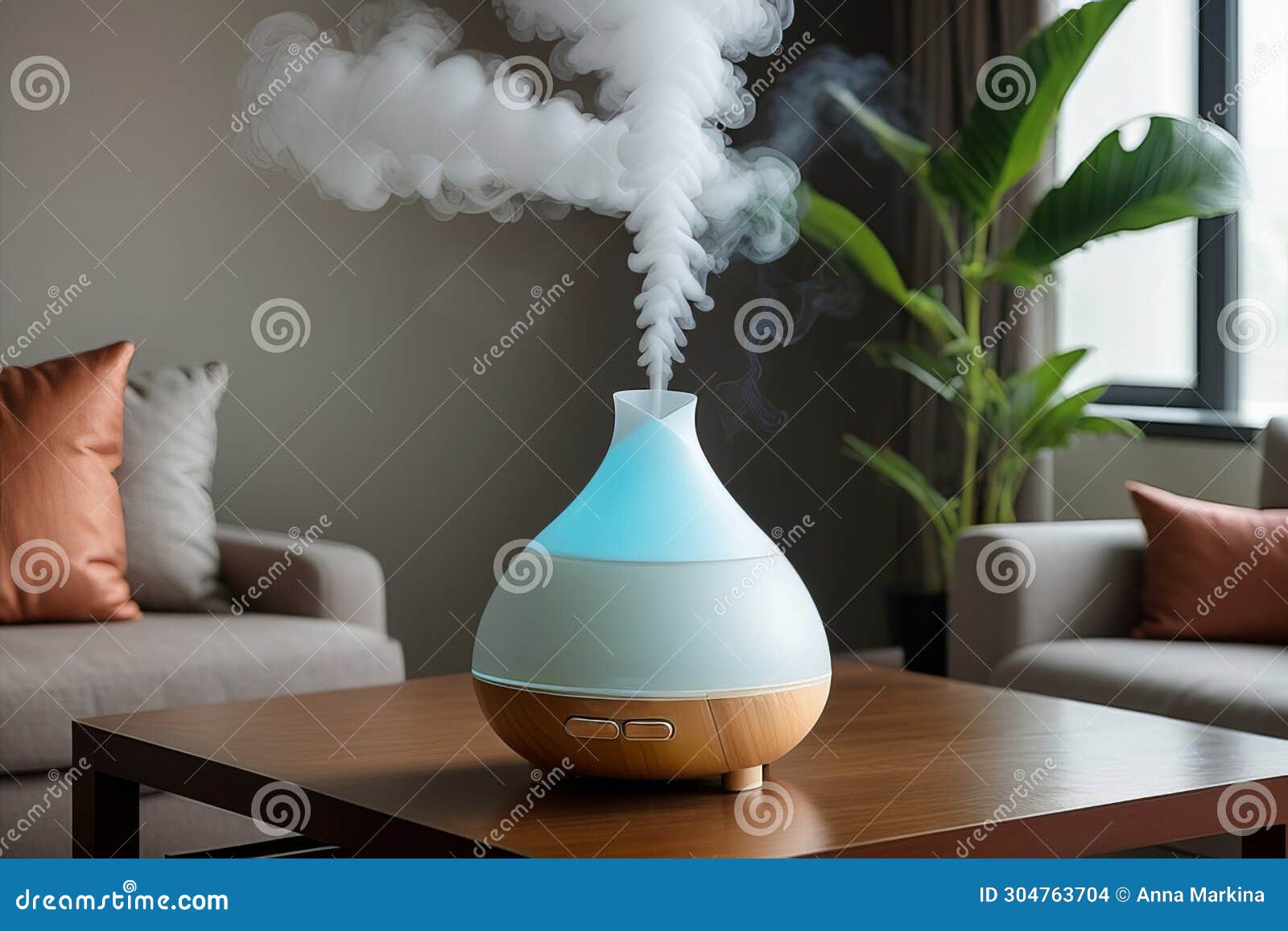 Aroma Oil Diffuser with Rising Steam Flow on Table in Living Room ...