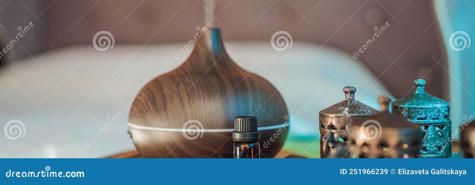 Aroma Oil Diffuser with Aroma Oil on Table at Home. Air Freshener ...