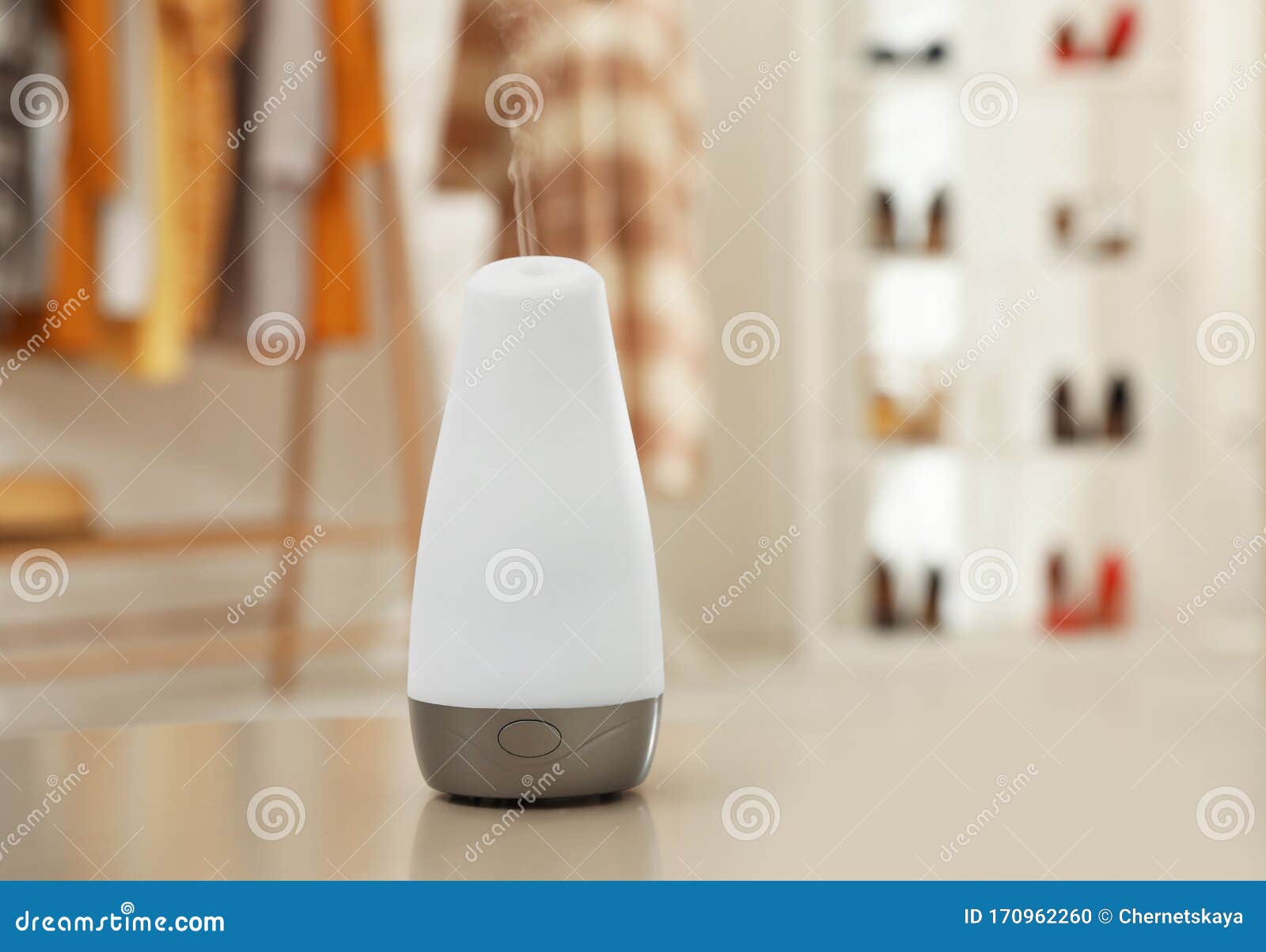 Aroma Oil Diffuser on Table Indoors. Air Freshener Stock Photo - Image ...