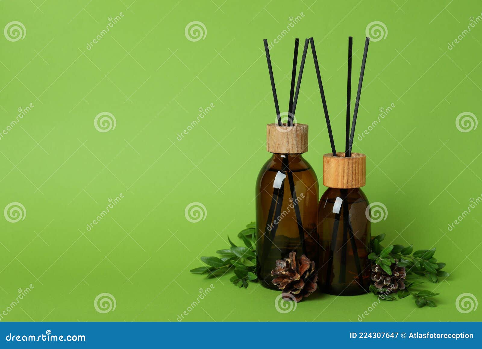 Aroma Scent Diffusers, Cones and Leaves on Green Background Stock Image ...