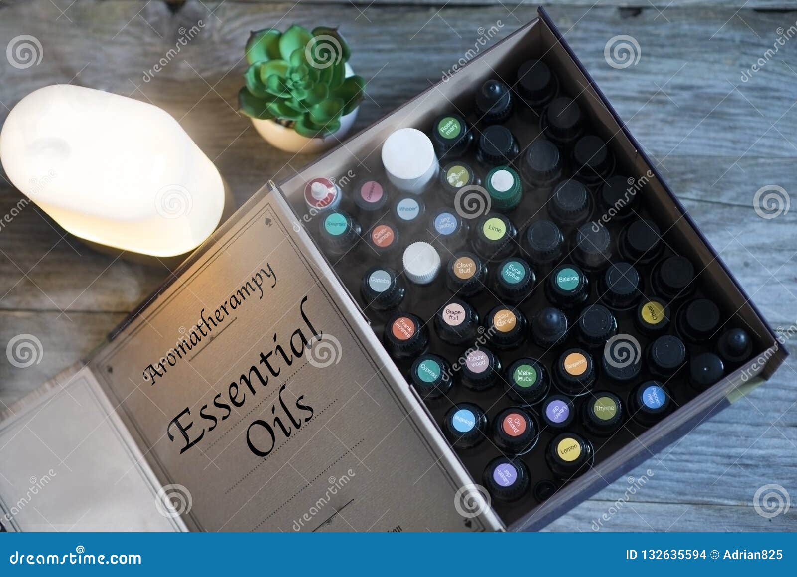 Aromatherapy Concept with Essential Oils and Oil Diffuser on Wooden ...