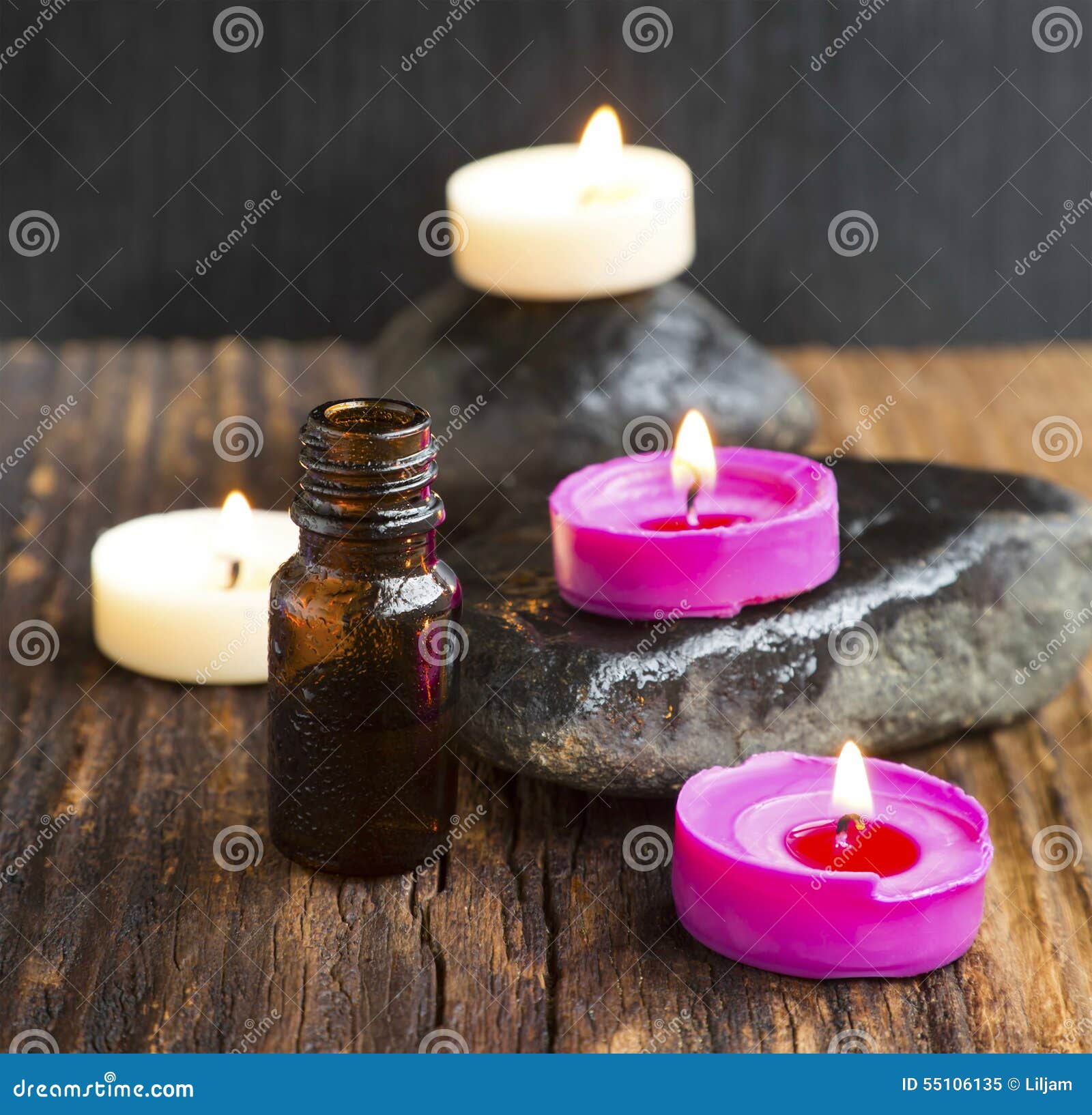 Aromatherapy Essence Bottle with Scent Candles Burning Stock Image ...