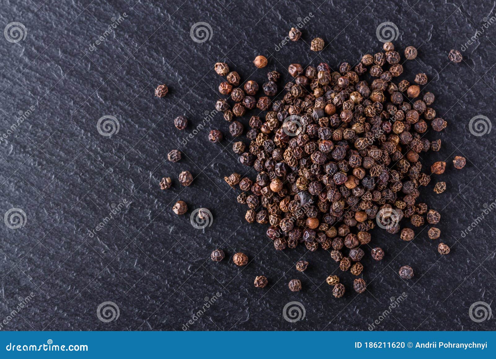 Aromatic Black Pepper on a Dark Stone Background Stock Photo - Image of ...
