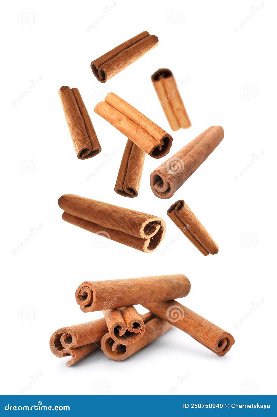 Aromatic Cinnamon Sticks Falling on White Background Stock Image ...