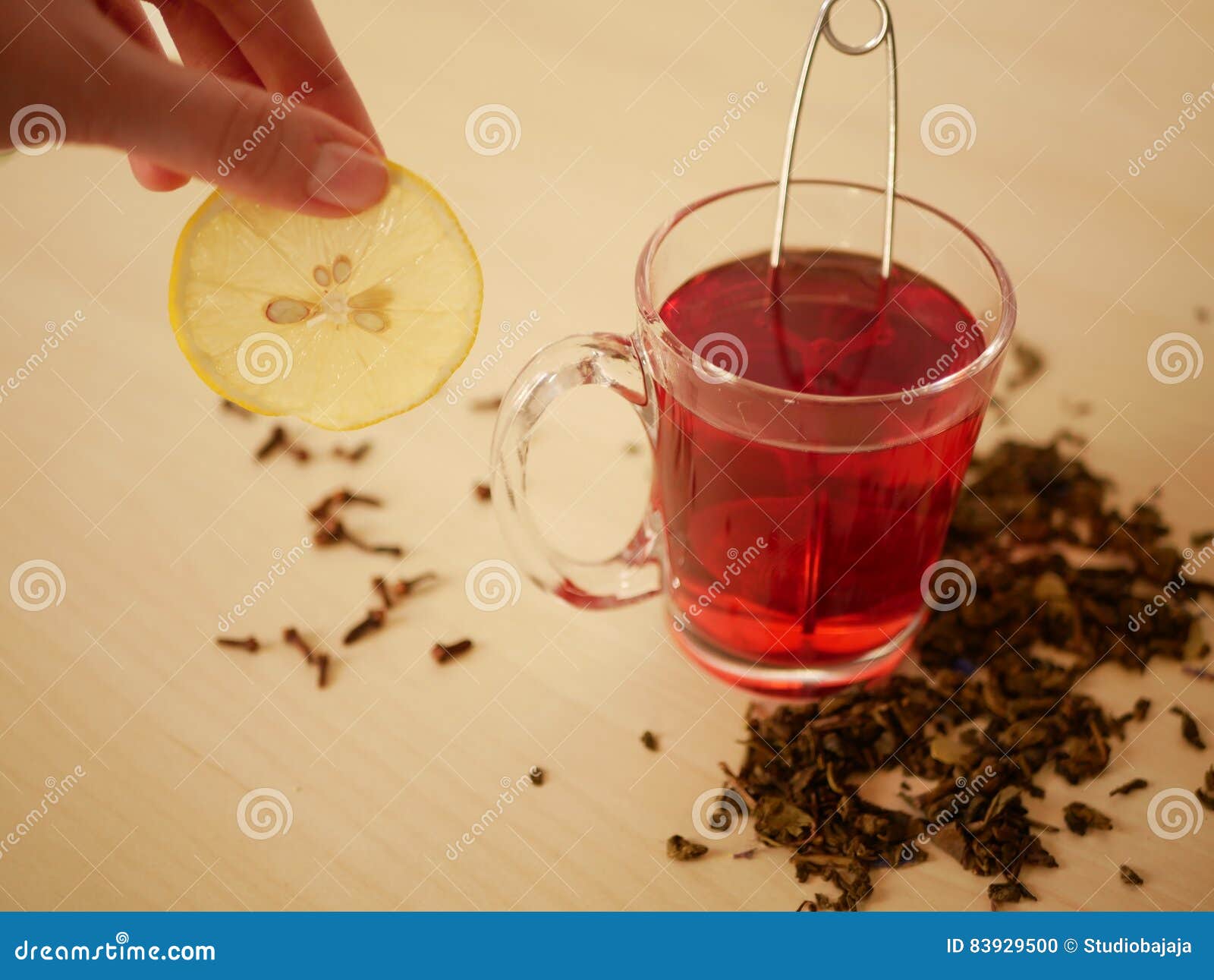 Aromatic Tea with a Hand Holding a Lemon. Stock Photo - Image of slice ...