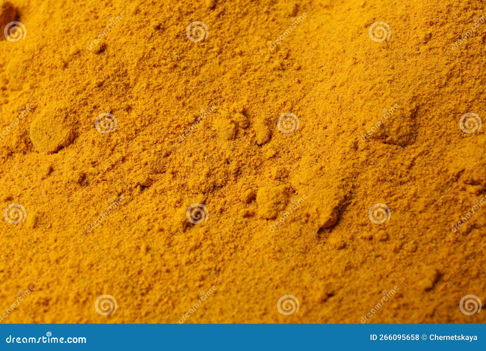 Aromatic Turmeric Powder As Background, Closeup View Stock Photo ...