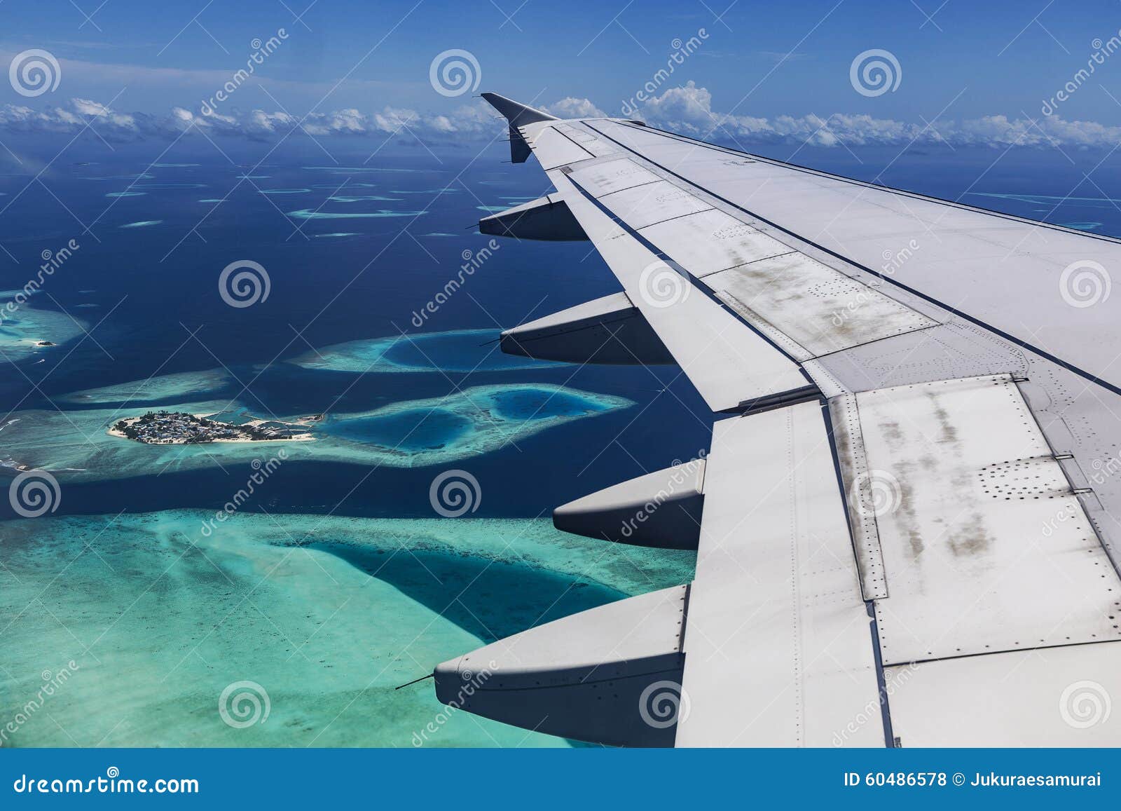Arplane fly over Atolls stock photo. Image of pristine - 60486578